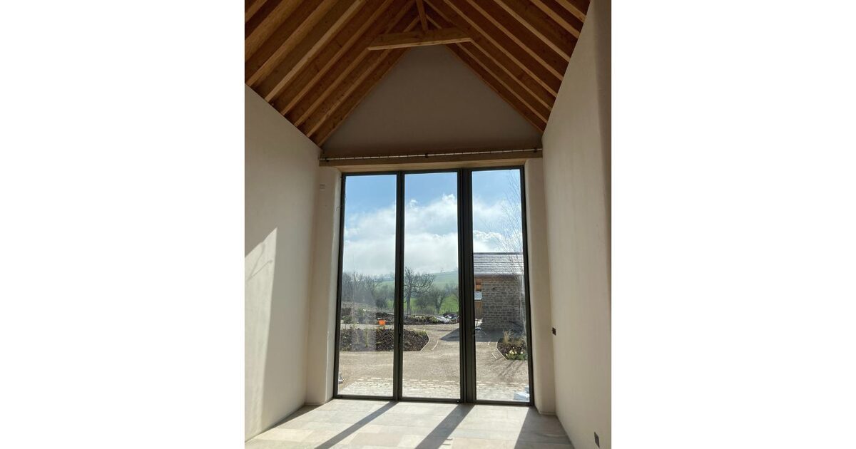 Ultra Tall Bifolding Doors to Ennox Farm | 1st May 2024 | News | IQ Glass