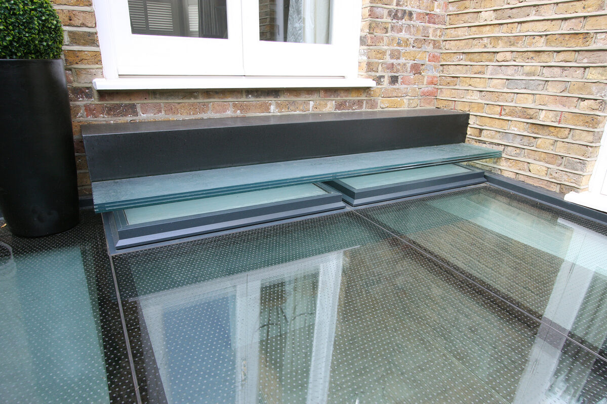 Design considerations for opening glass rooflights within structural ...