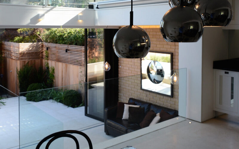Douglas Road Glass Box Extension with Bi Fold Doors | IQ Glass